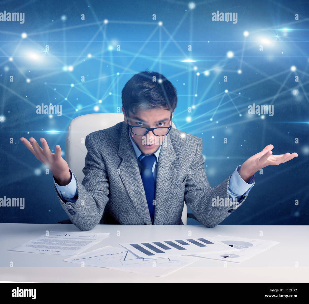 Manager in front of the office desk with networking concept Stock Photo ...