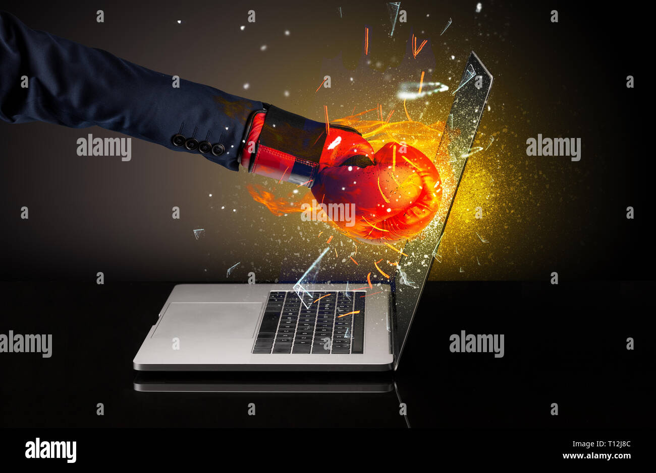 Firing hand hitting strongly laptop screen glass Stock Photo - Alamy