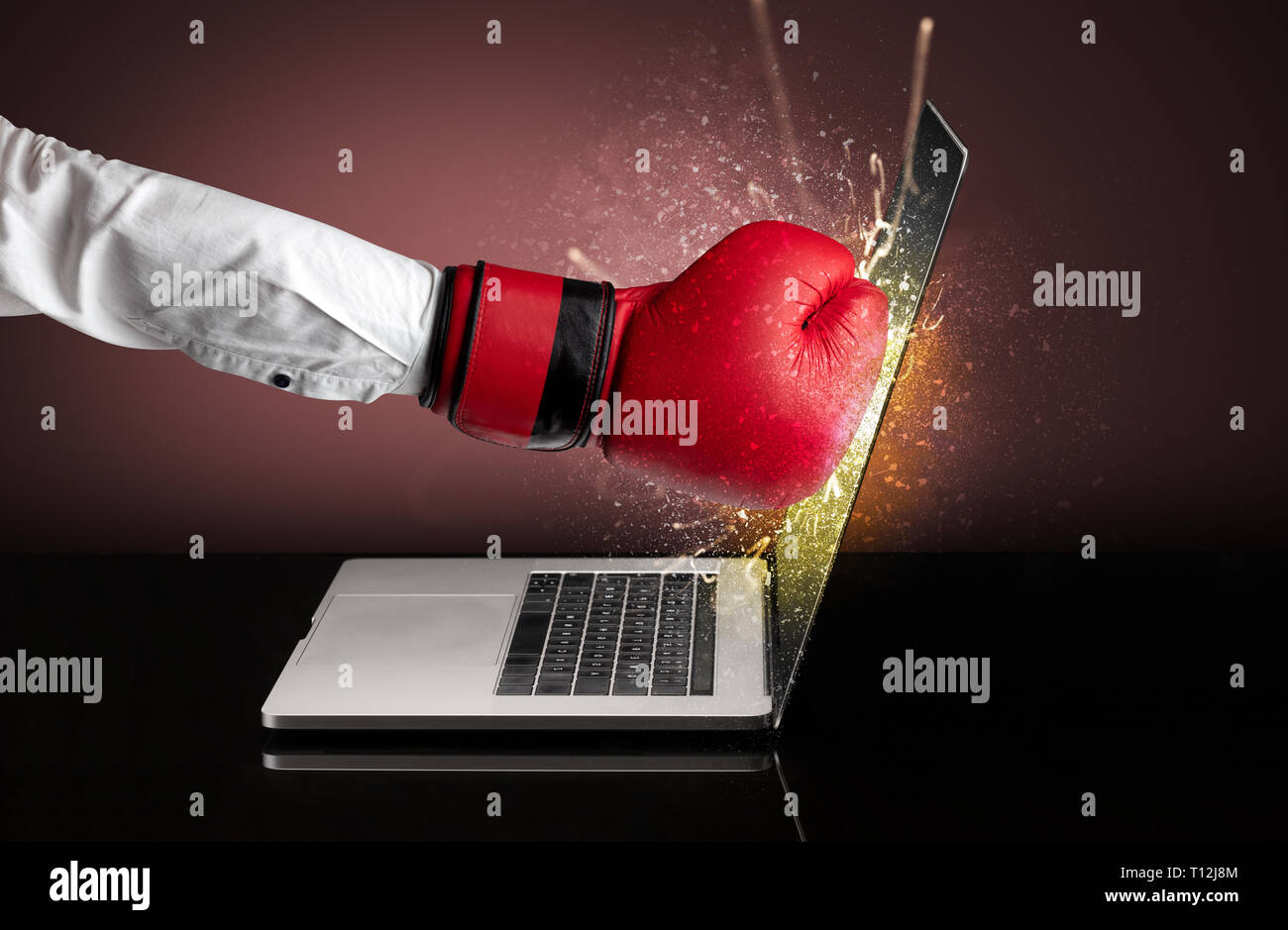 Strong arm boxing laptop screen strongly Stock Photo - Alamy