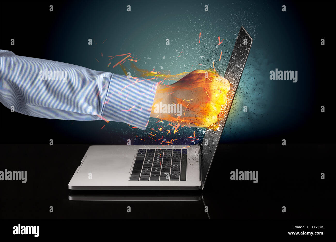 Arm hitting strongly laptop screen which breaks in little pieces Stock ...