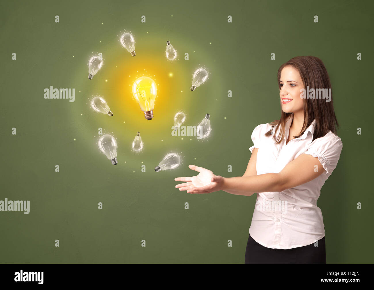 Young smiling person presenting new idea concept Stock Photo - Alamy
