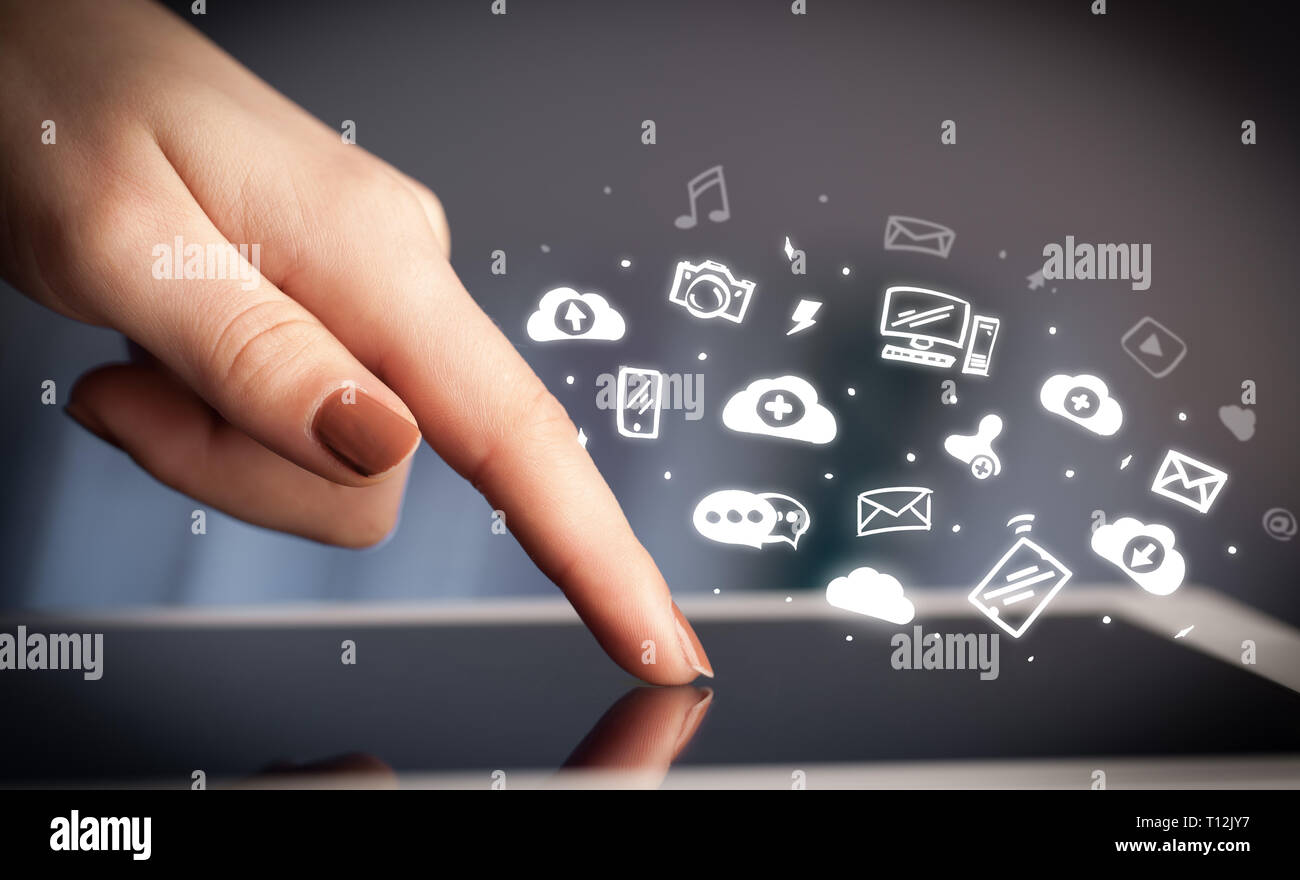 Hand holding tablet with social media concept Stock Photo - Alamy