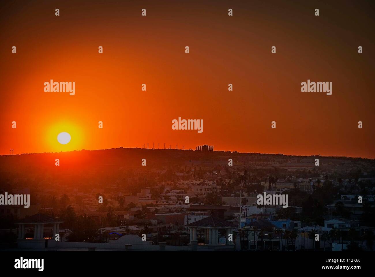 The colours of a Pacific sunset over the resort of Cabo San Lucas in ...
