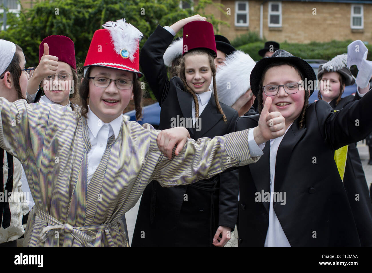 in fancy dress costumes for the Jewish holiday of Purim in Stamford ...