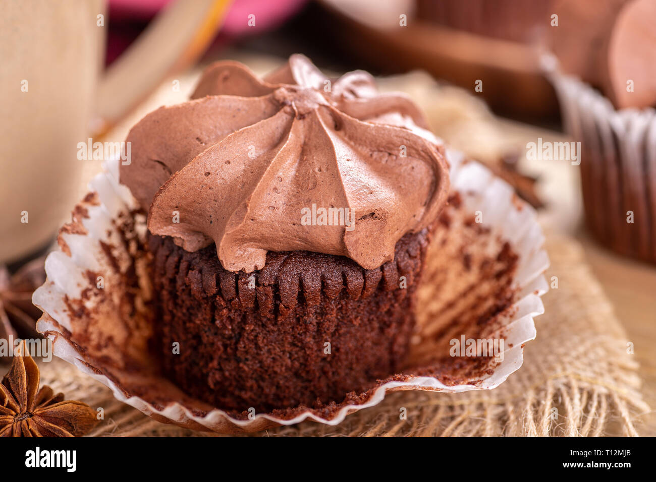 Closeup of a chocolate cupcake with creamy icing Stock Photo - Alamy