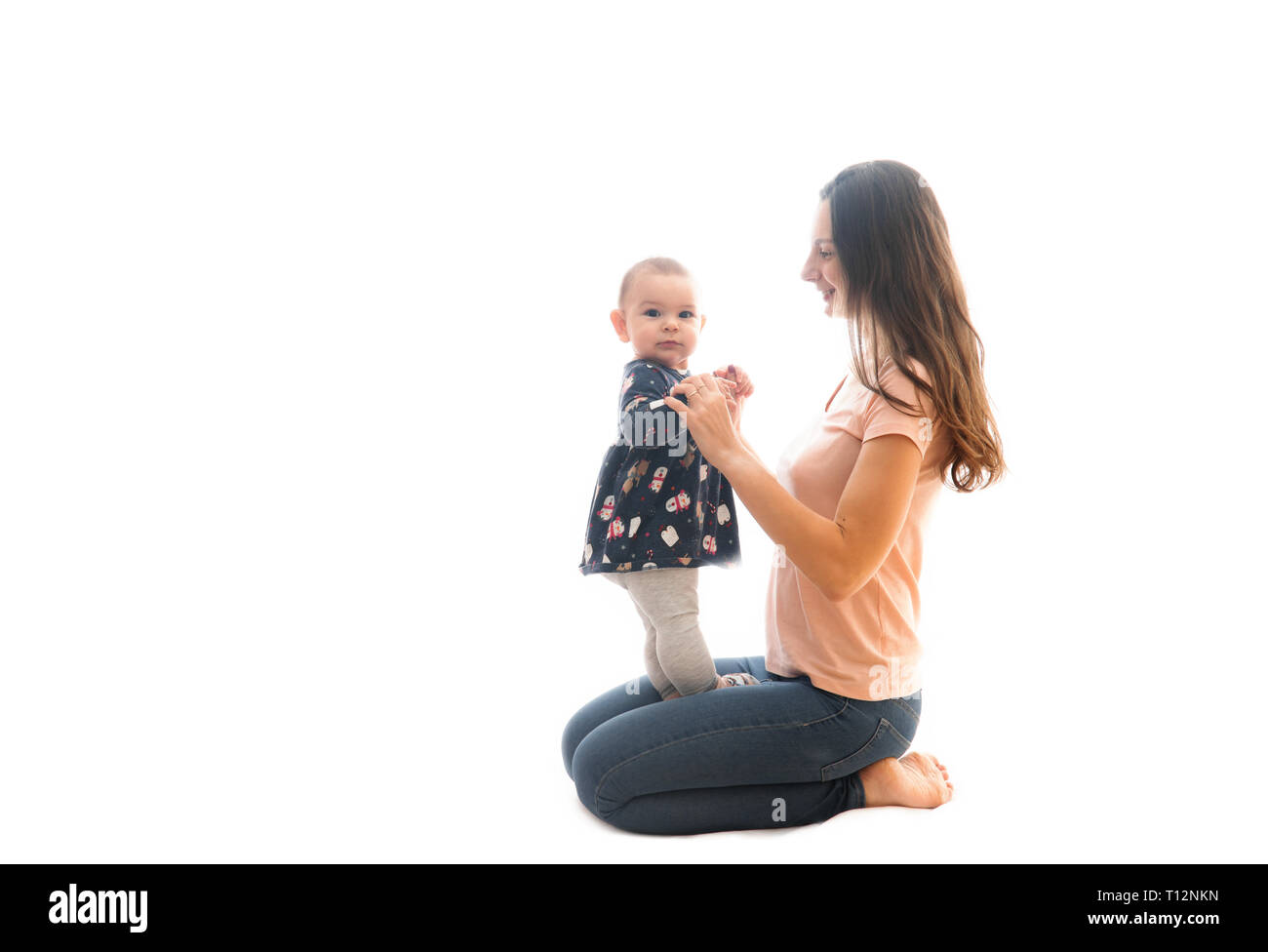 A mother and baby bonding together isolated on white background Stock ...