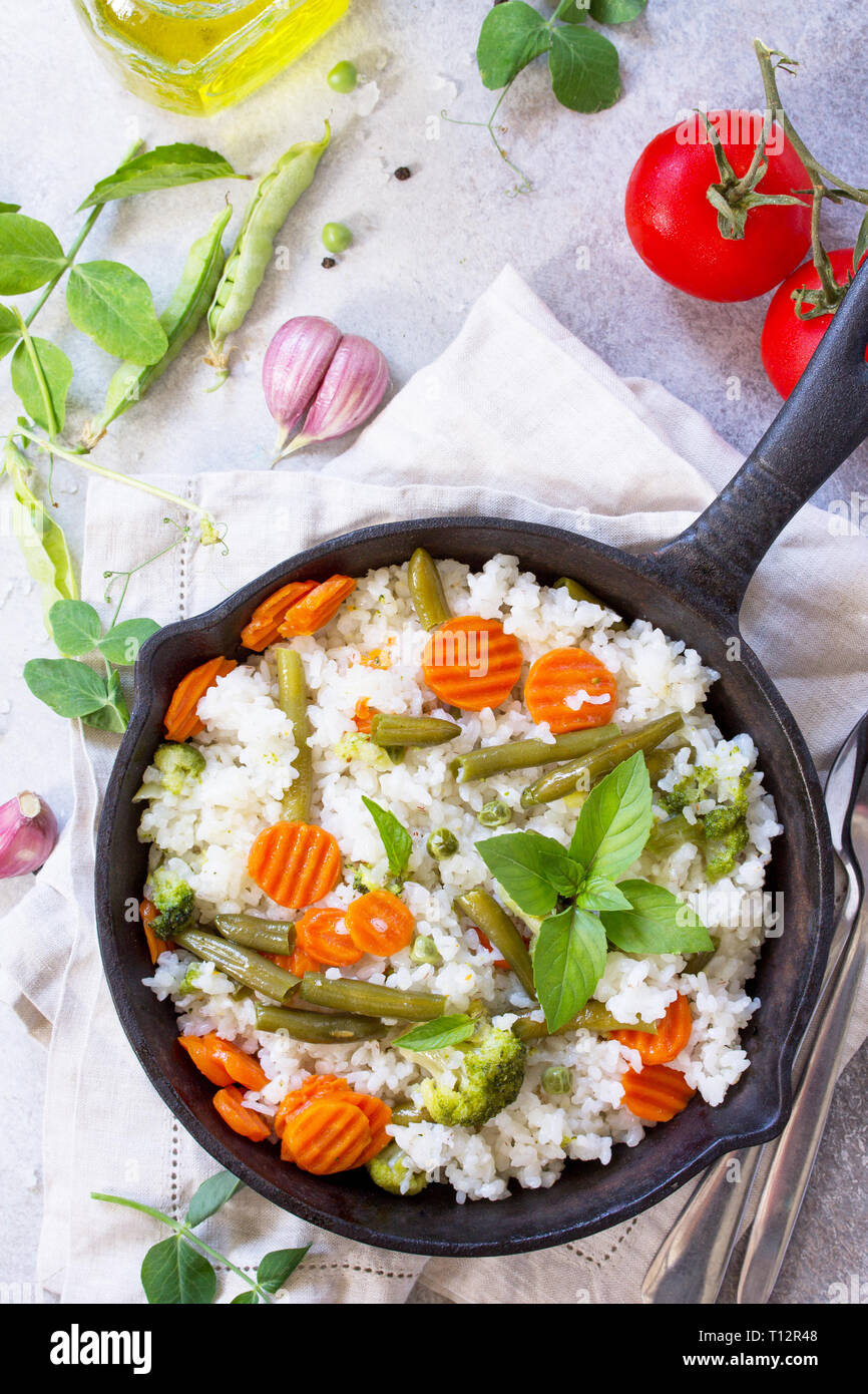 Healthy food: rice with vegetables. Diet vegan menu. Top view flat lay ...