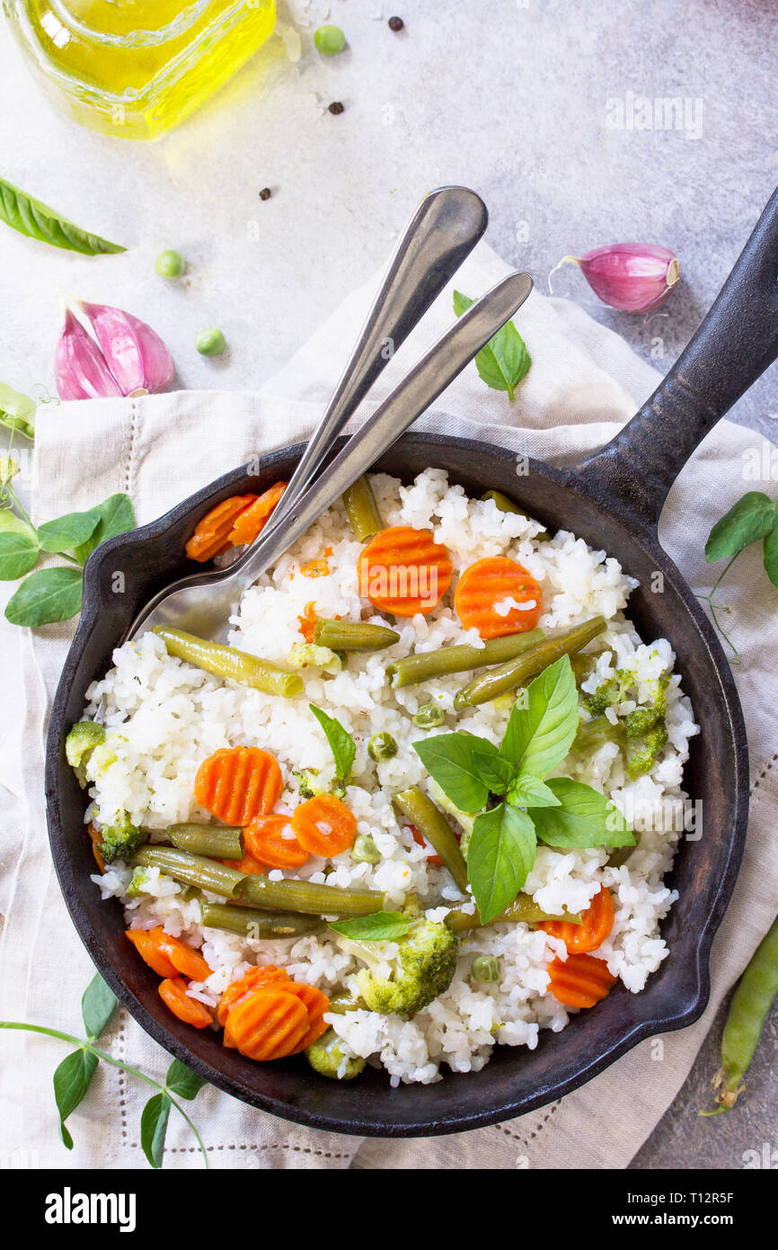 Healthy food: rice with vegetables. Diet vegan menu. Top view flat lay ...