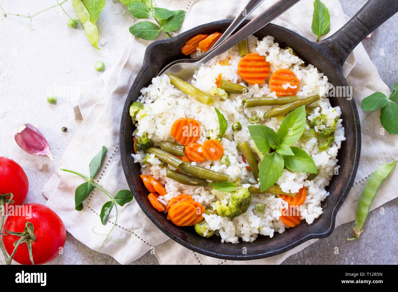 Healthy food: rice with vegetables. Diet vegan menu. Top view flat lay ...