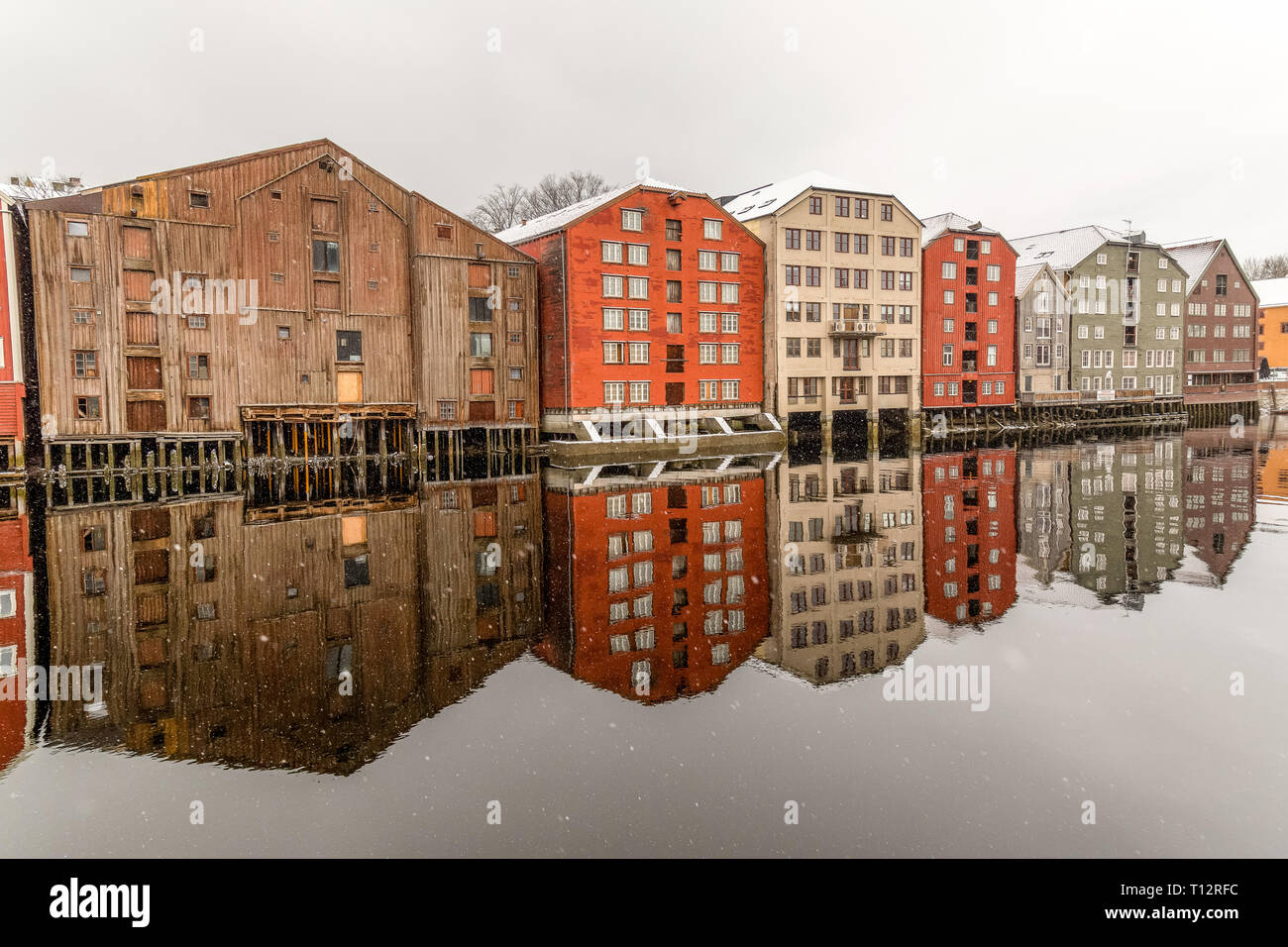 Wooden buildings sitting alongside the river channels that flow through ...