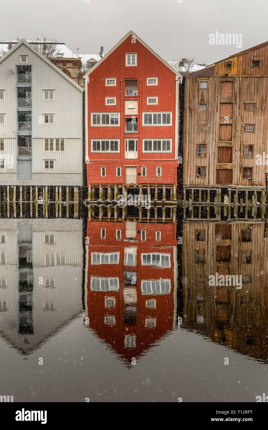 Wooden buildings sitting alongside the river channels that flow through ...