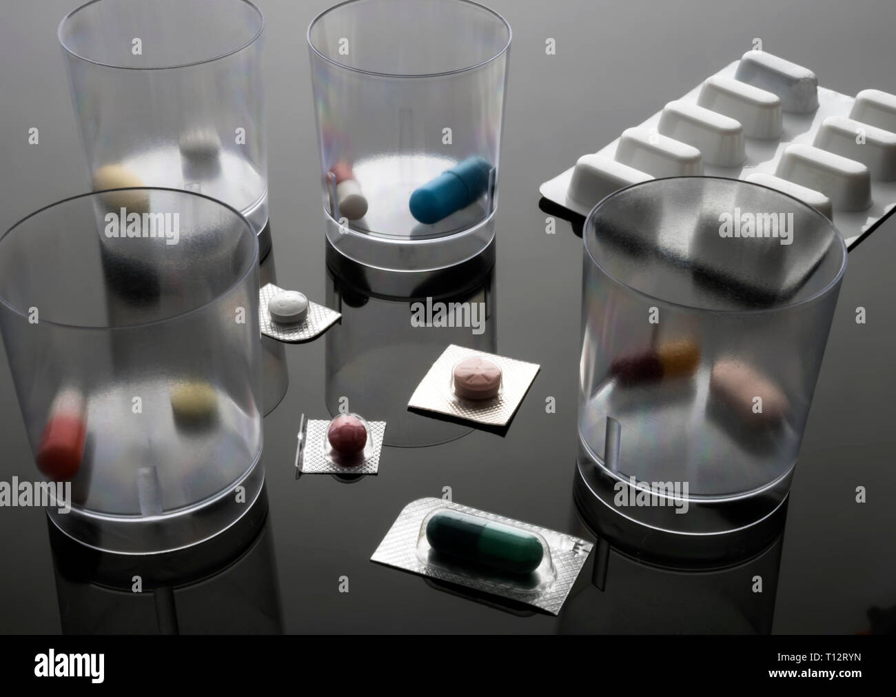 Different dosage medication in hospital, conceptual image, horizontal ...