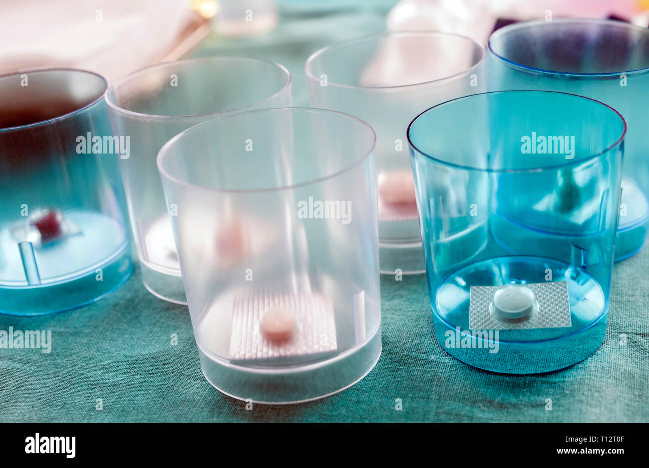 Different dosage medication in hospital, conceptual image, horizontal ...