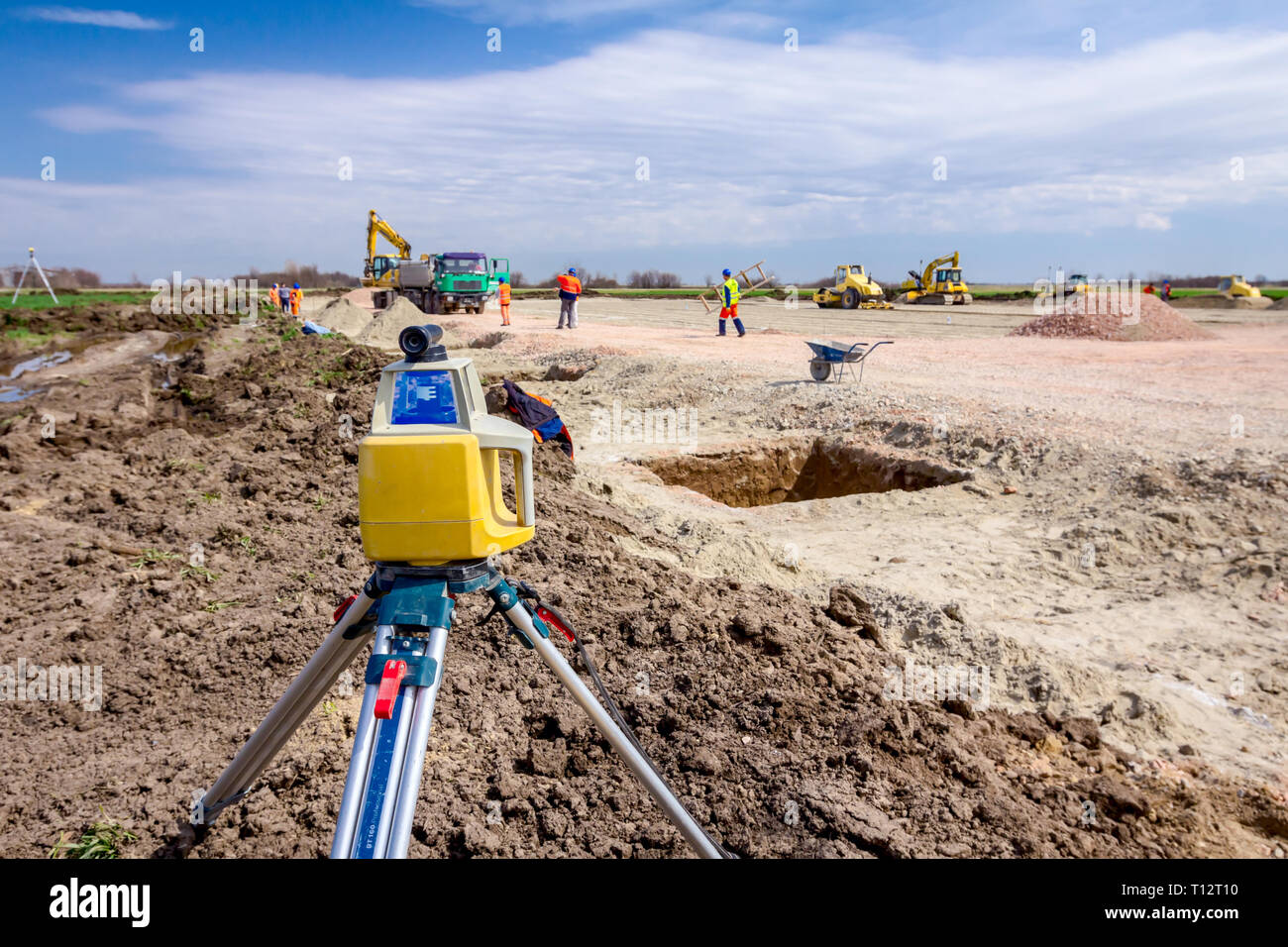 Total center device with laser for leveling other devices to level ...