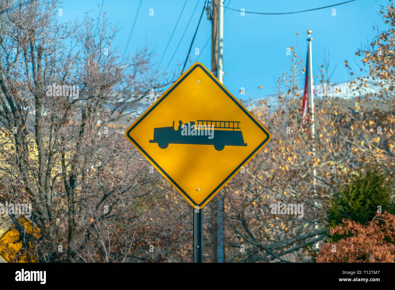 Firetruck warning sign in Salt Lake City Utah. Yellow diamond firetruck ...
