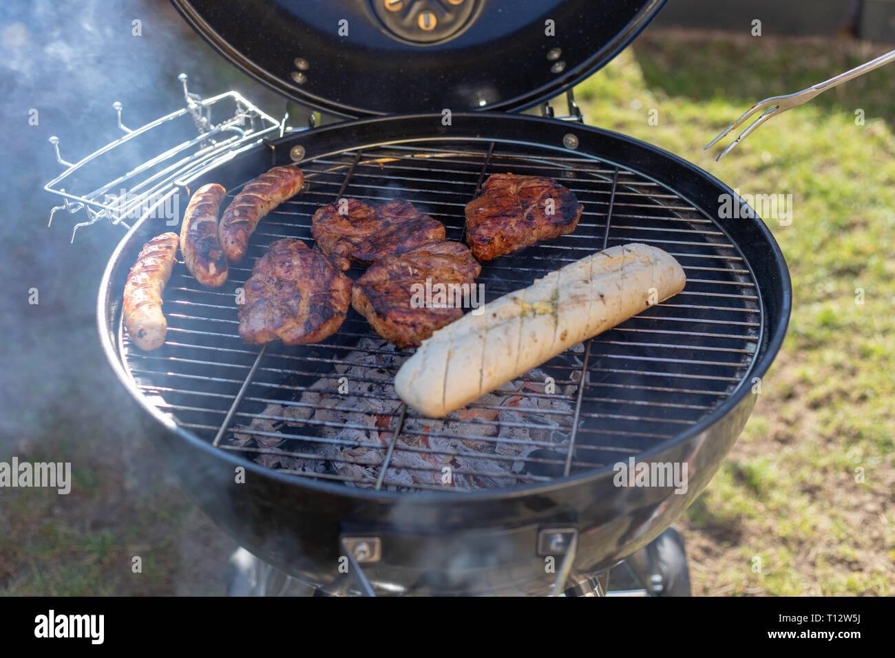 Grilling time hi-res stock photography and images - Alamy