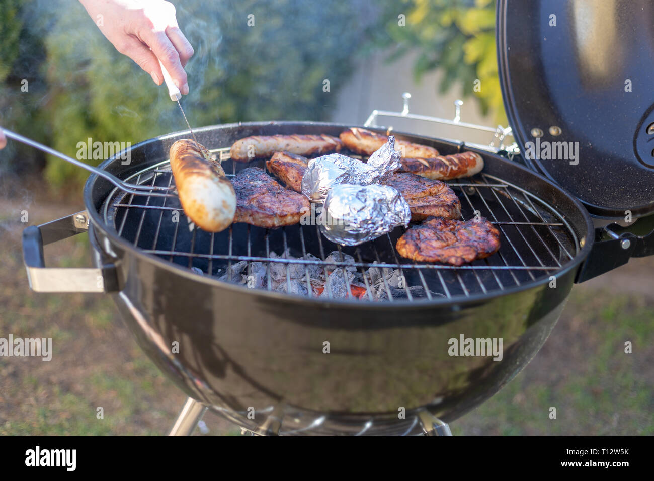 Grilling time hi-res stock photography and images - Alamy