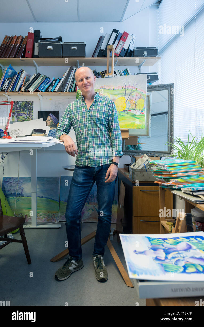 A creative artistic illustrator photographed in their interesting ...