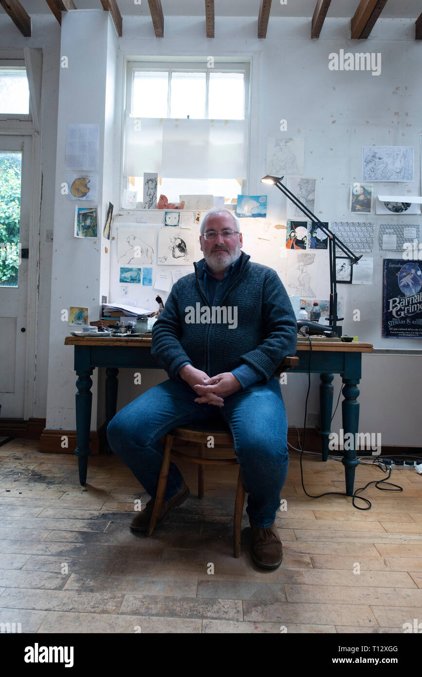 A creative artistic illustrator photographed in their interesting ...