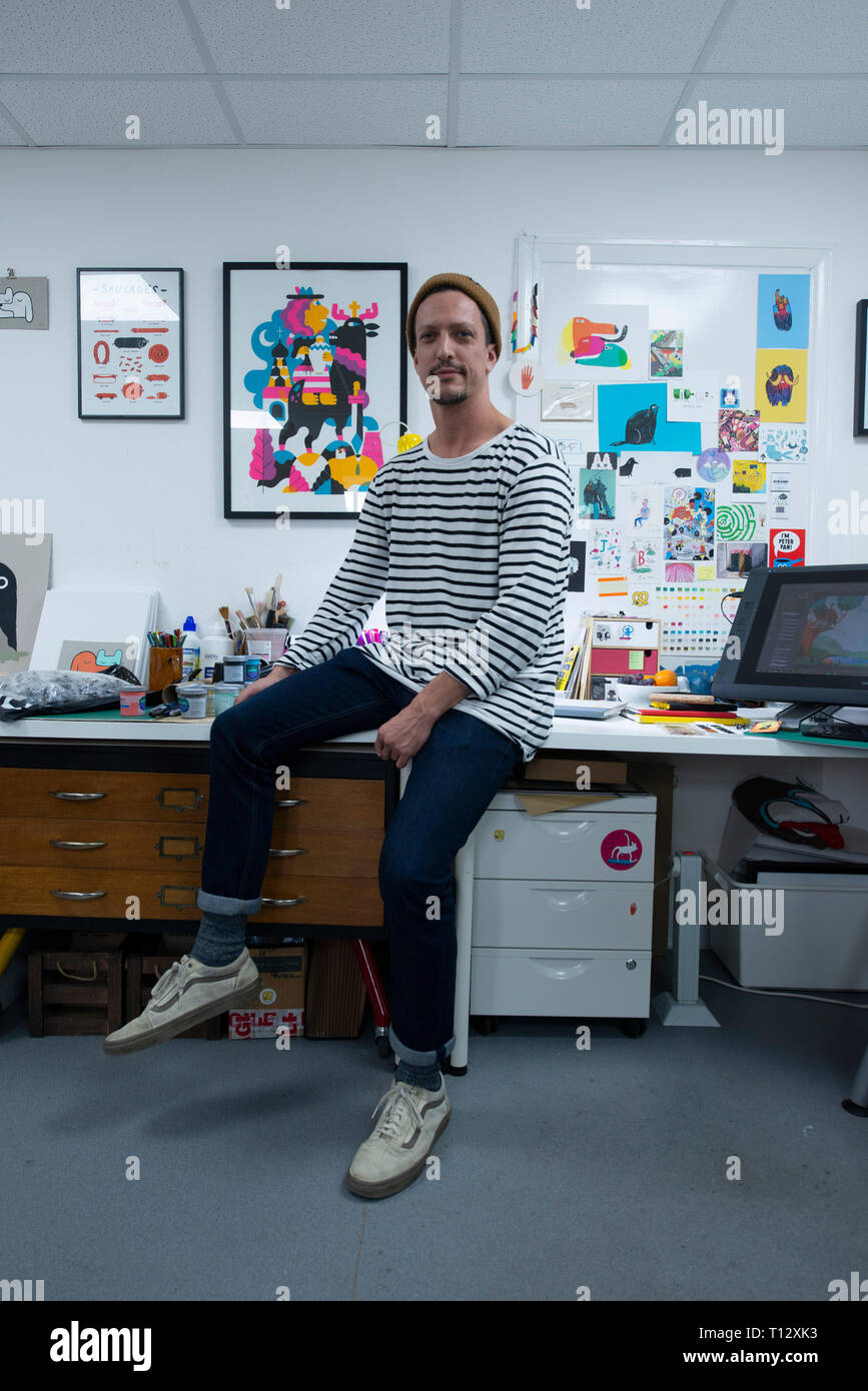 A creative artistic illustrator photographed in their interesting ...