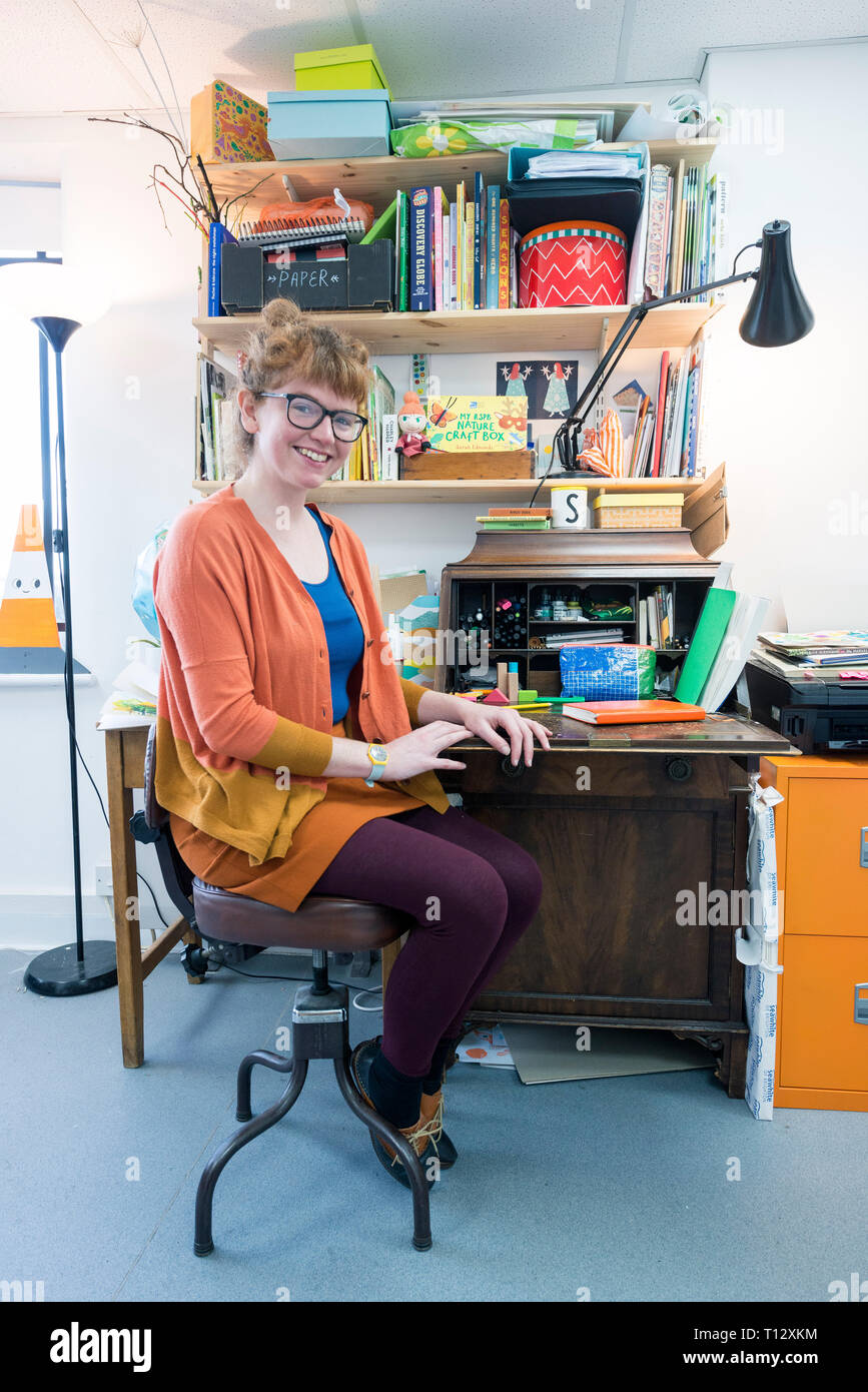 A creative artistic illustrator photographed in their interesting ...