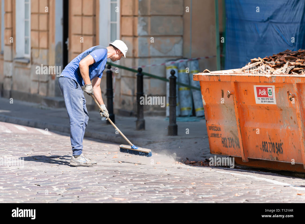 Cleaner sweeping uniform urban hi-res stock photography and images - Alamy