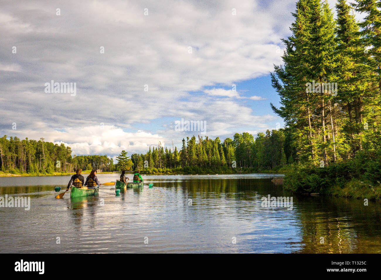 Women canoeing on Montagnais Lake, Quebec Stock Photo - Alamy