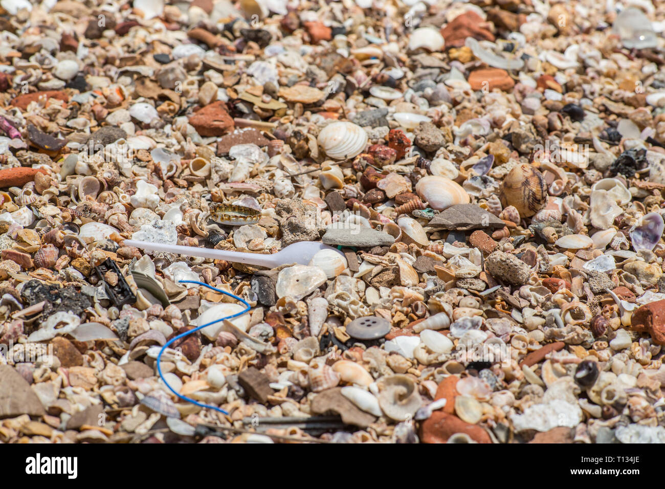 Close up of plastic waste on a beach Stock Photo - Alamy