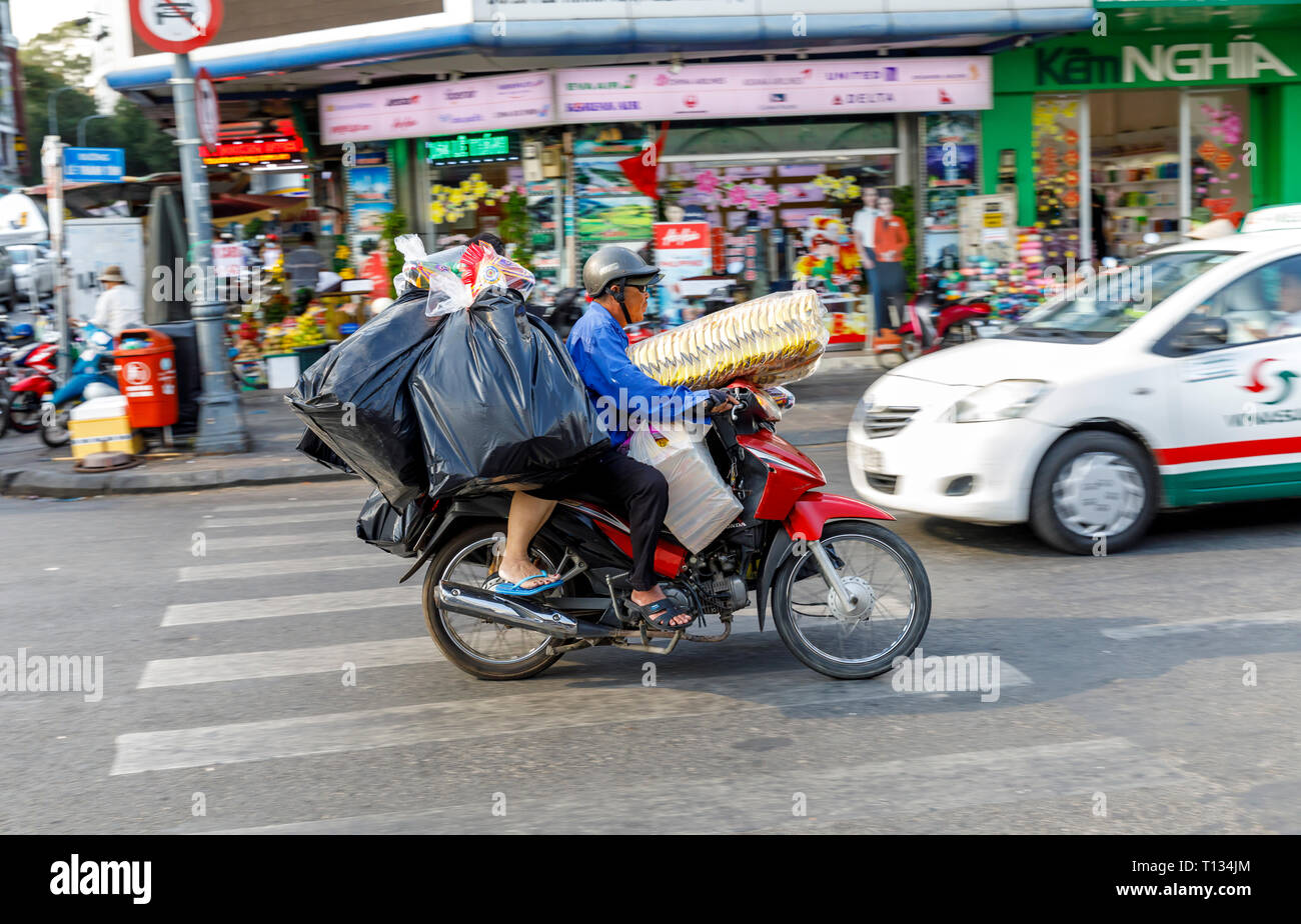 Three people on a motorcycle hi-res stock photography and images - Alamy