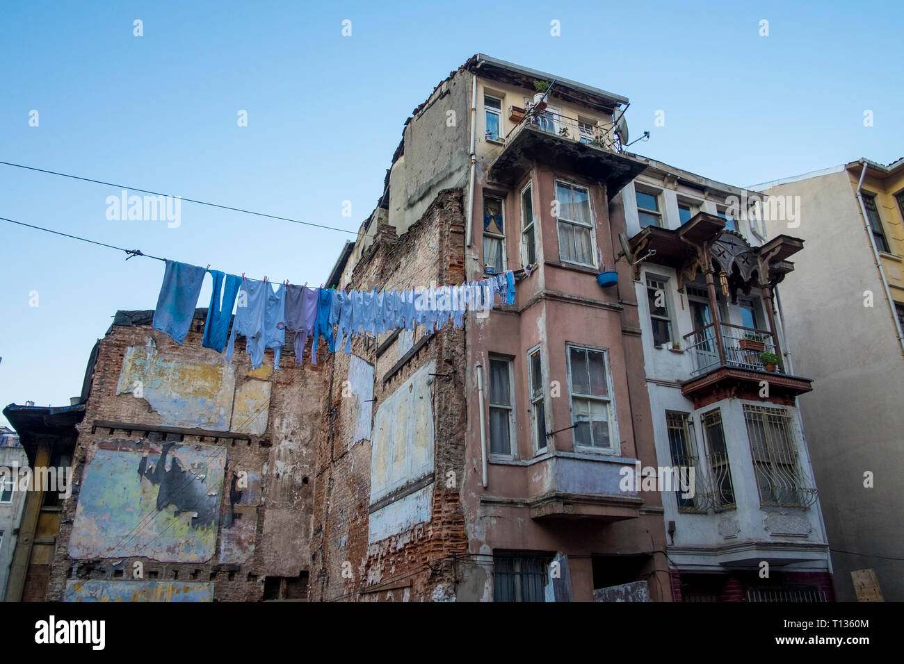 Laundry hung on a line for drying in a working class neighborhood in ...