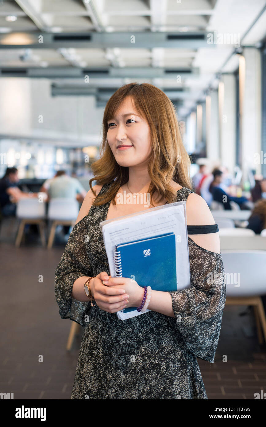 A young south east asian student poses for a photo in a Dutch ...