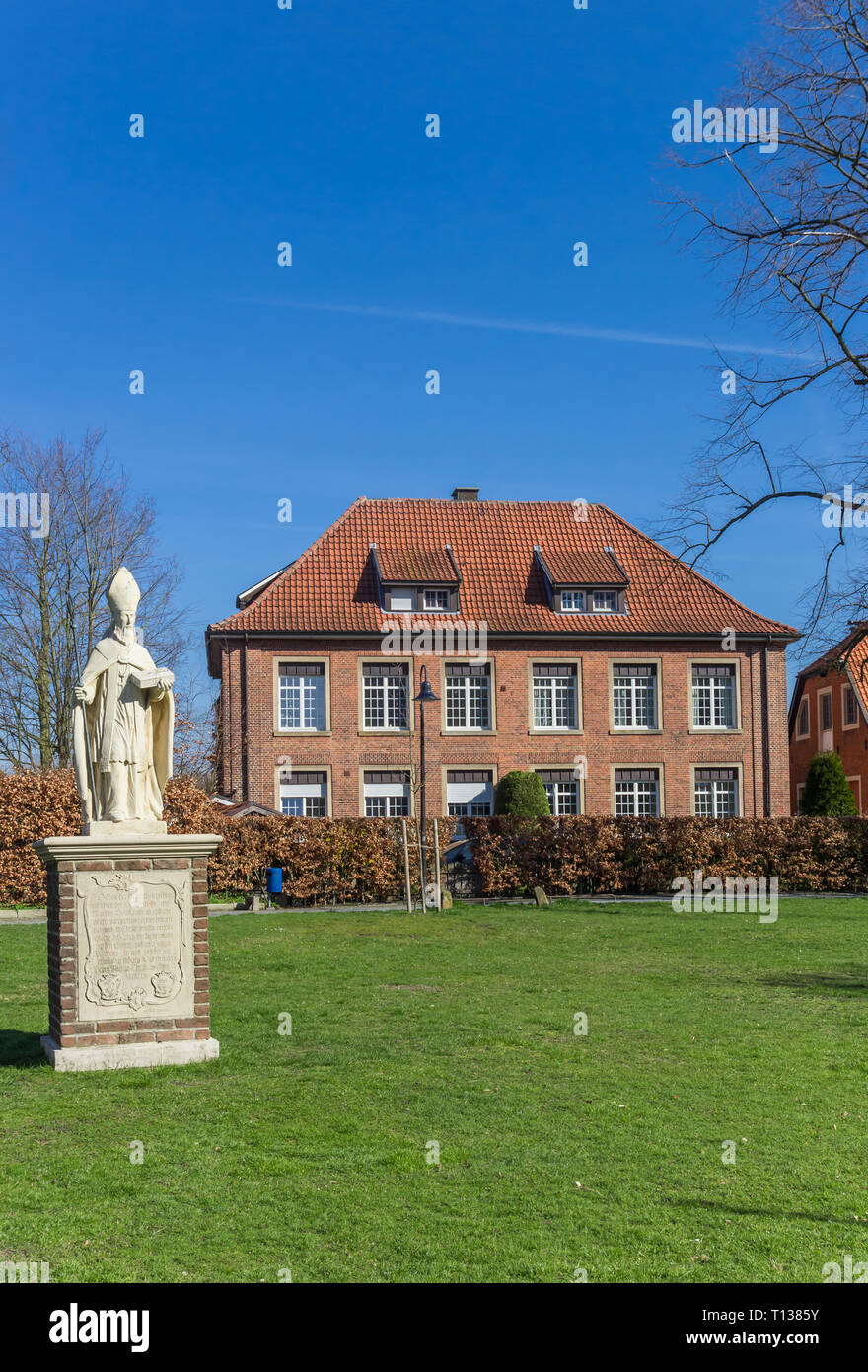 Statue of Boniface in the historic center of Freckenhorst, Germany ...