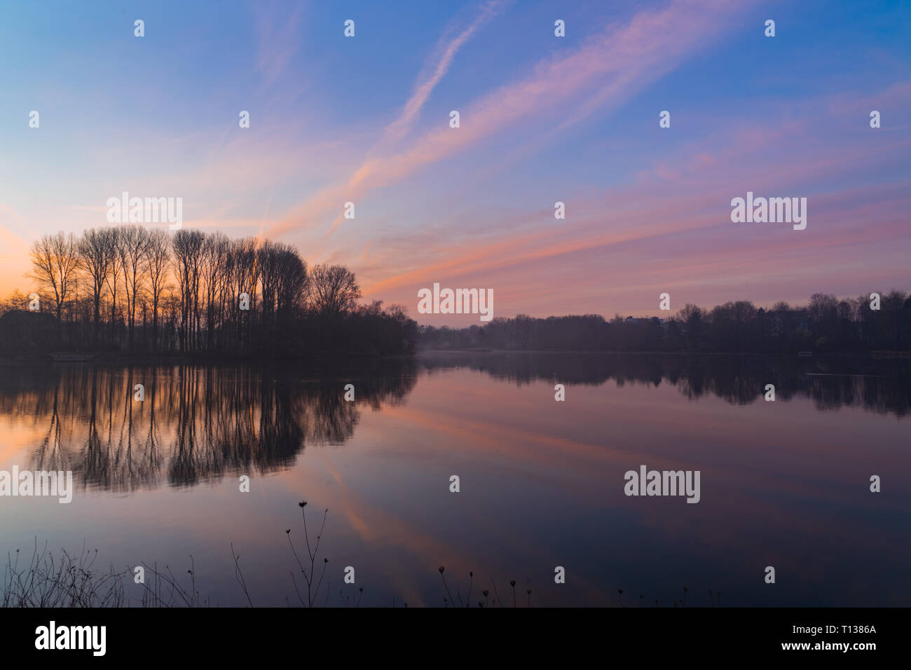 Sunrise over lake Padersee Stock Photo - Alamy