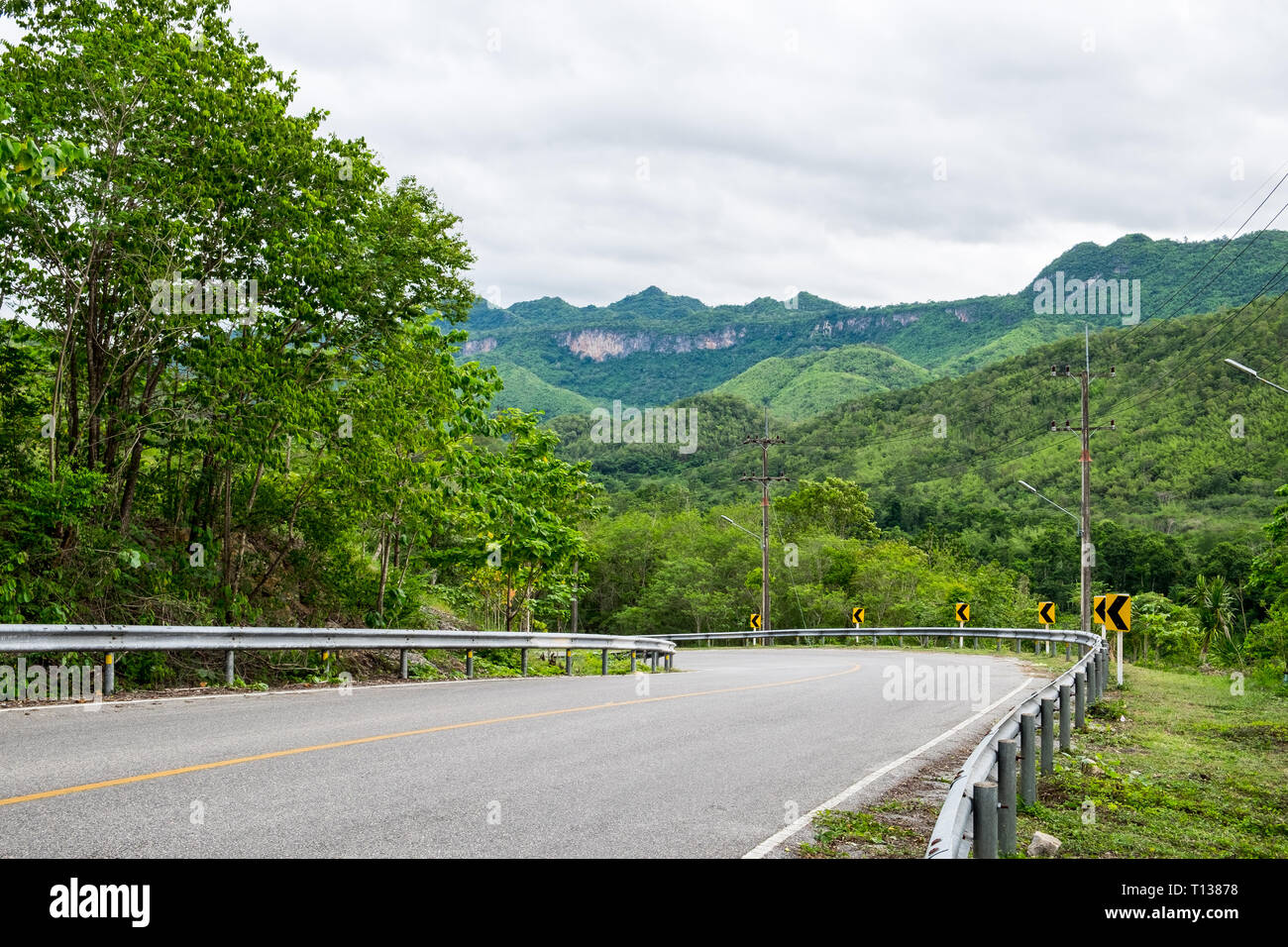 Road green mountain curve natural freshness Stock Photo - Alamy