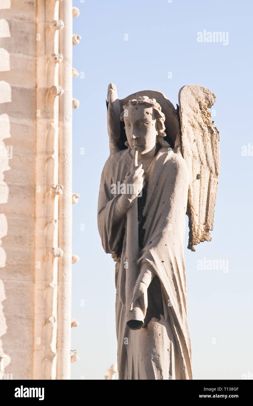 Sculpture of an angel on the roof of the Cathedral of Notre Dame de ...