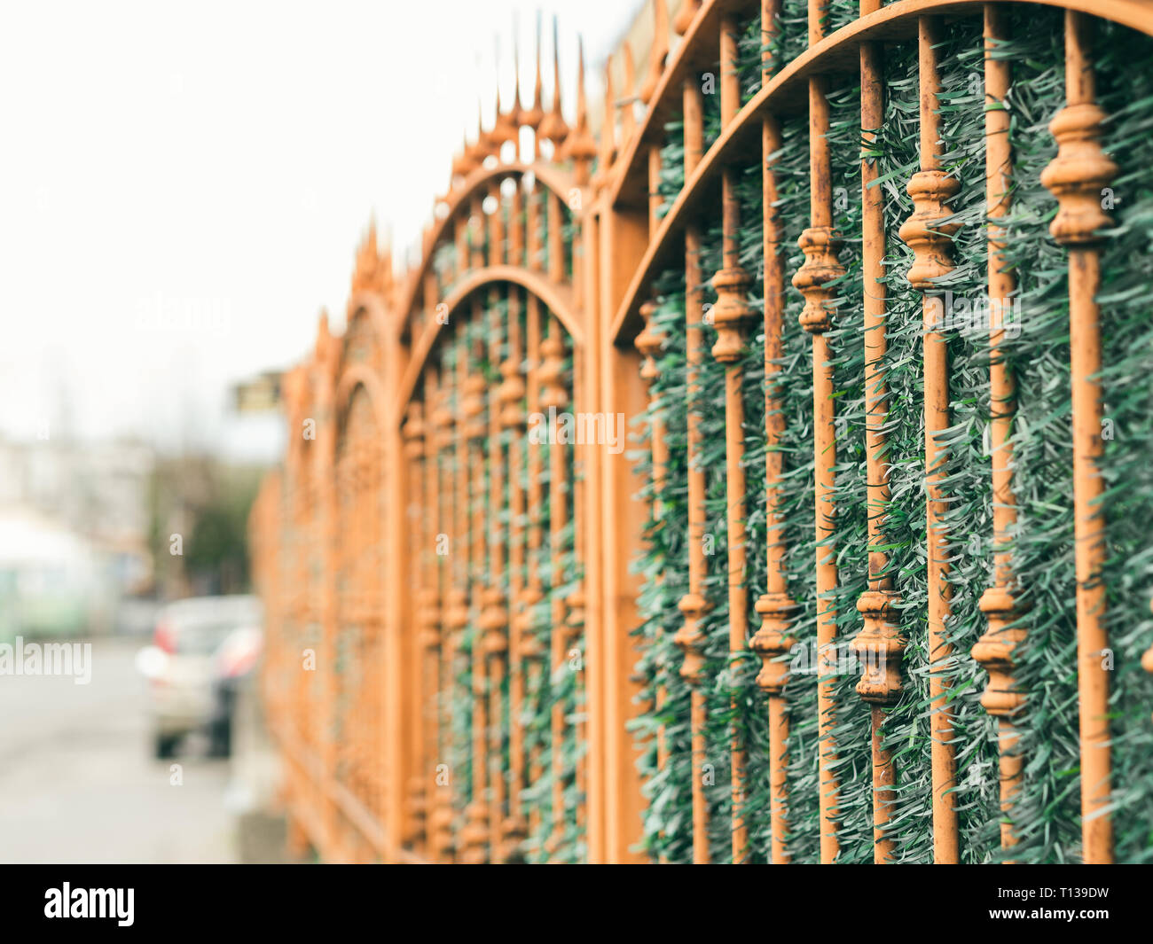 Urban detail - metal fence of a building Stock Photo - Alamy