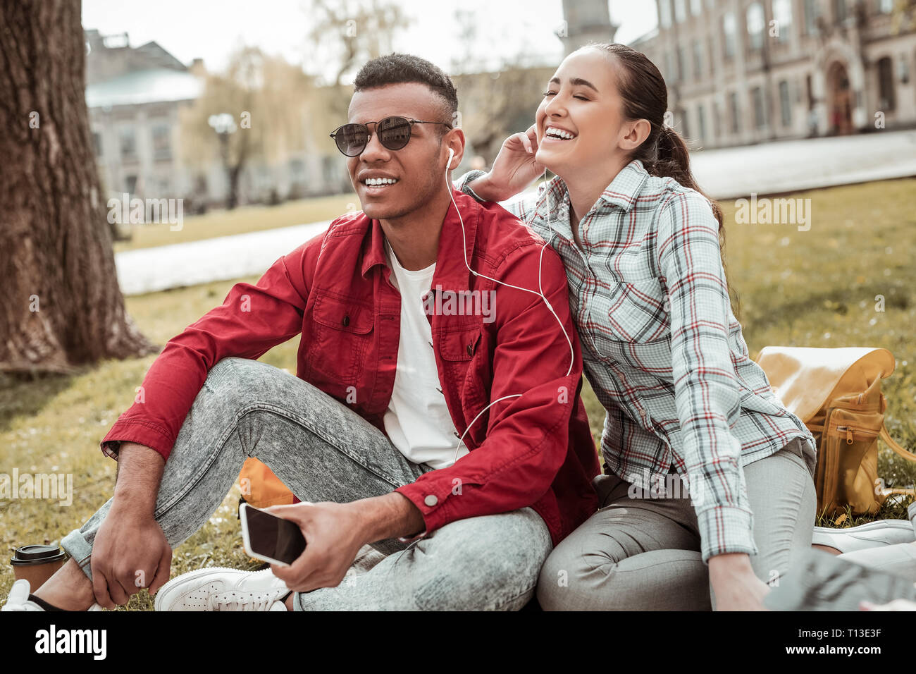 Positive delighted students being outside during break Stock Photo - Alamy