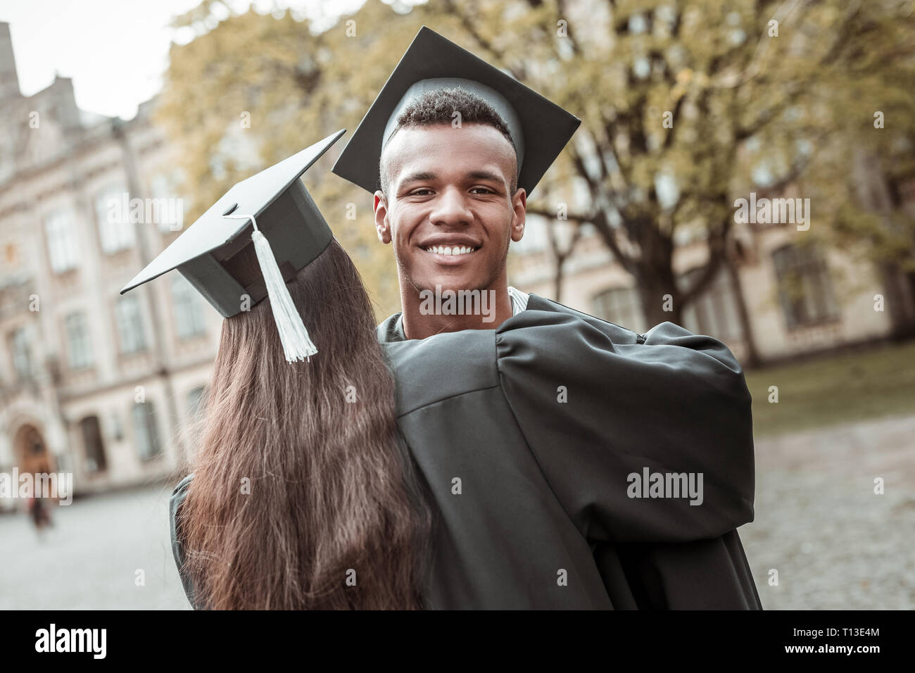 Happy international male person looking at camera Stock Photo - Alamy