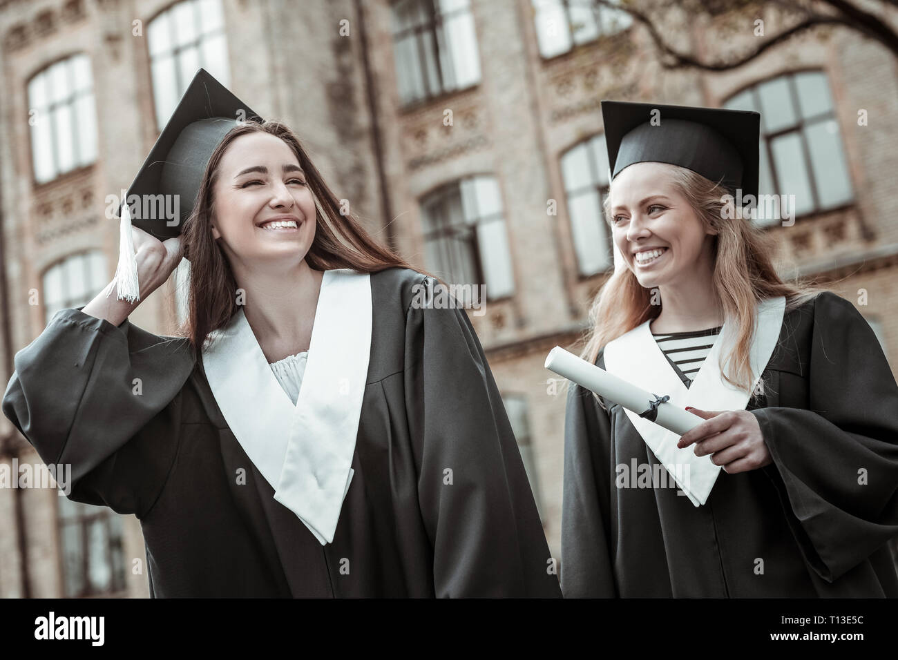 Uniform graduate graduation group hi-res stock photography and images ...