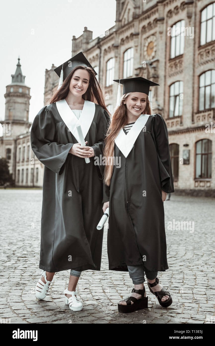 Joyful girls having graduation party at university Stock Photo - Alamy