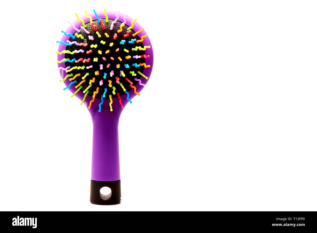 Bright multi-colored hair comb on a white background.Copy space Stock ...