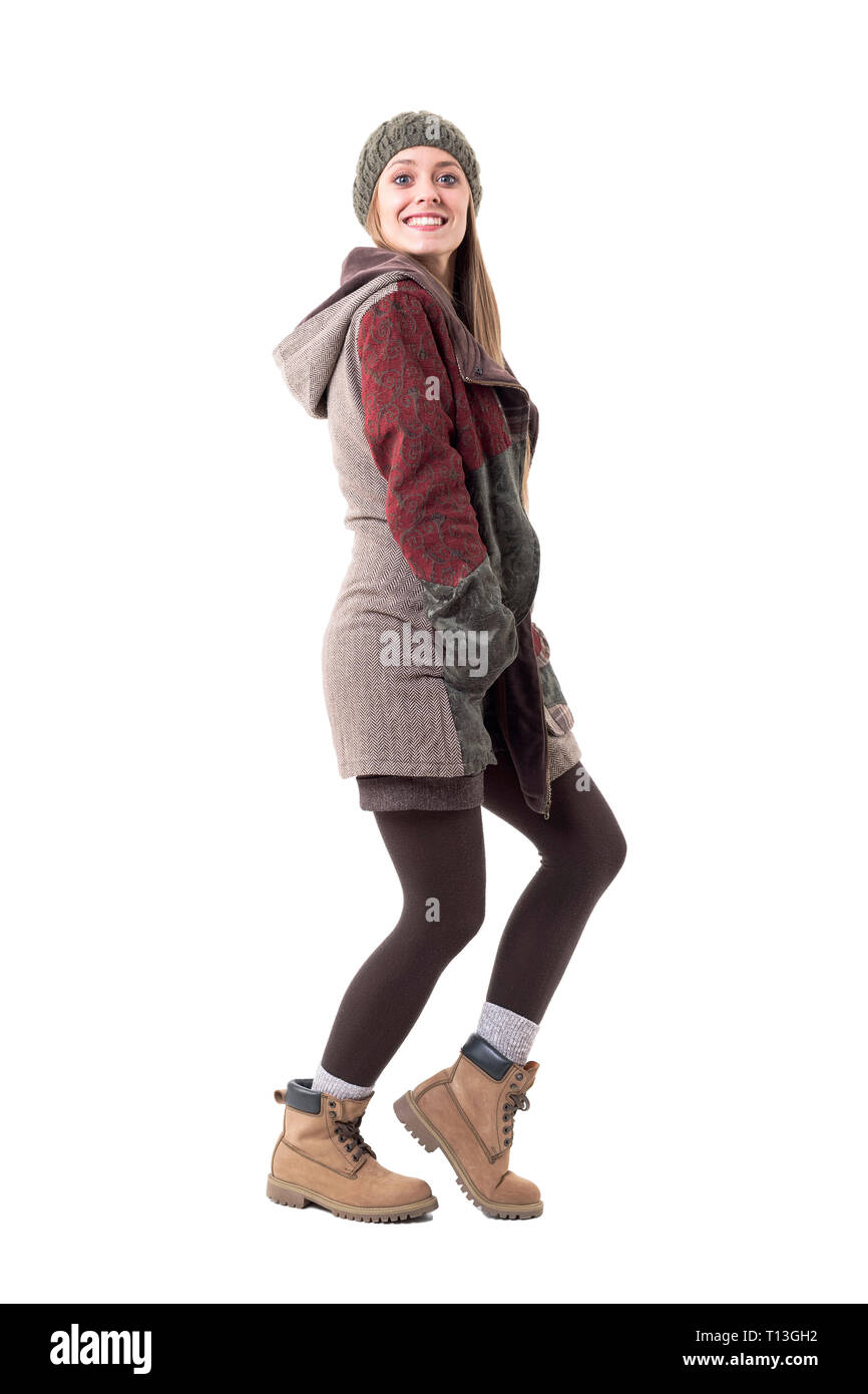 Excited young eager stylish woman anticipating good news smiling at ...