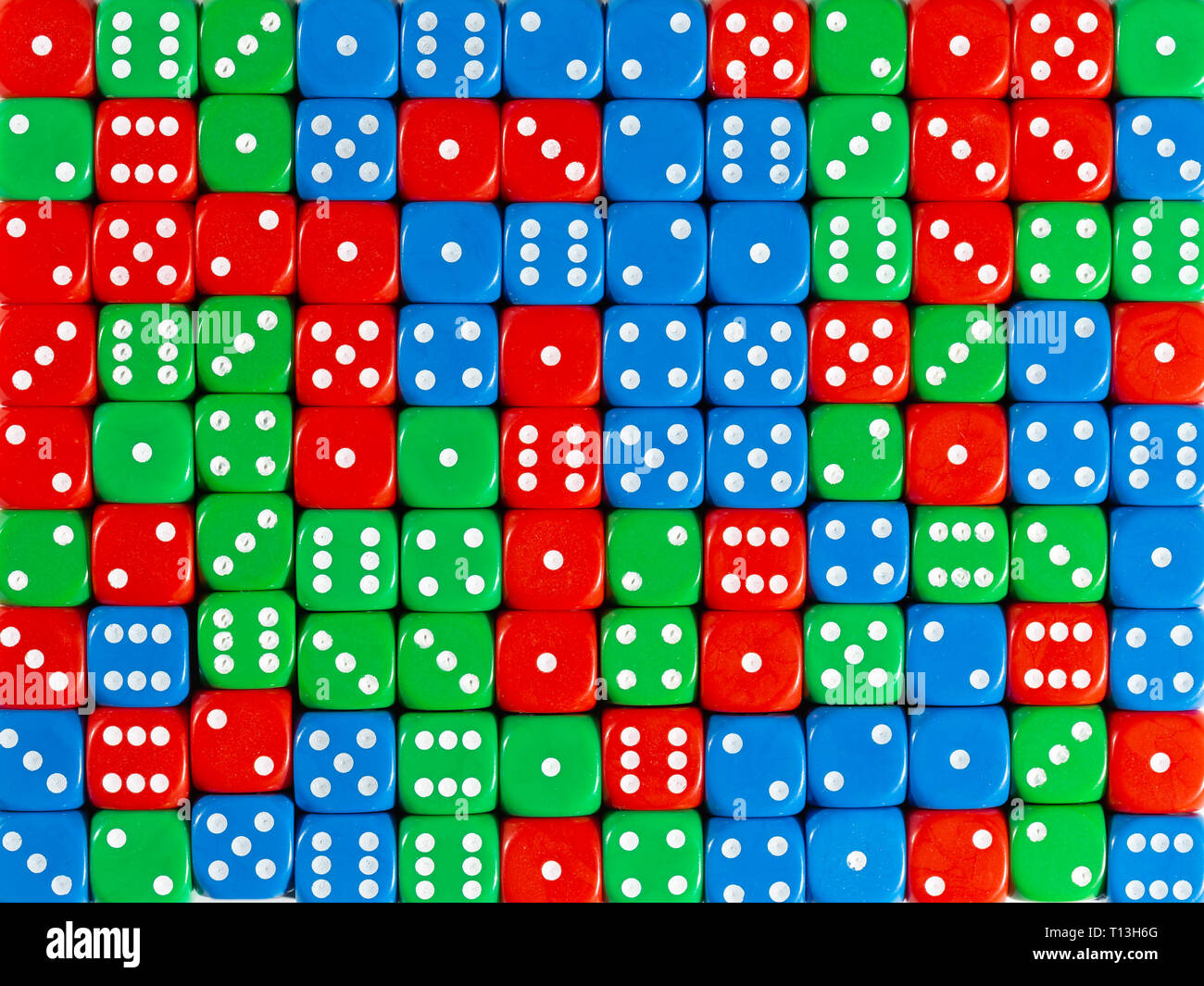 Background pattern of random ordered red, green and blue dices Stock ...