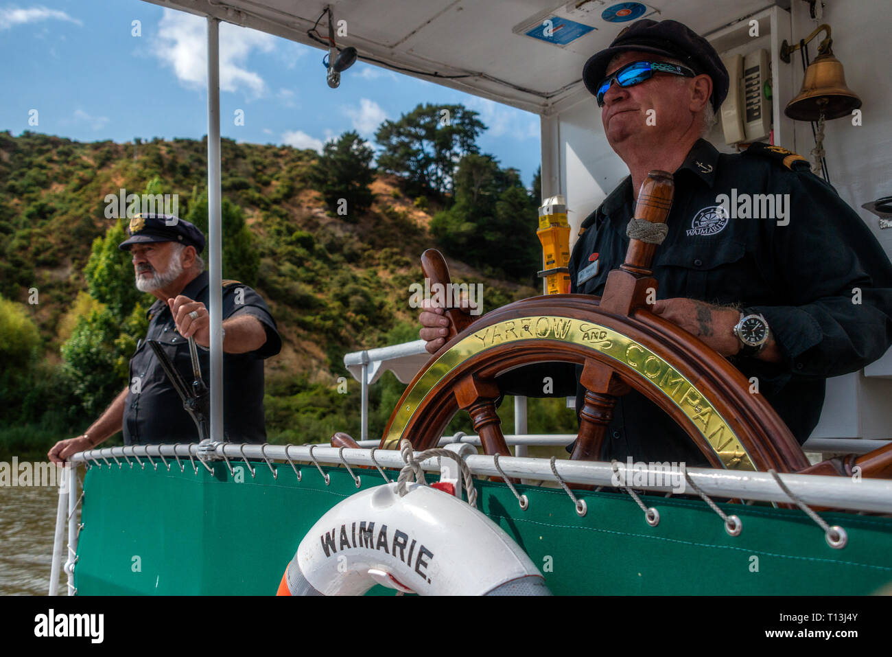 Captain and helmsman on the restored, Waimarie paddle steamer. This ...