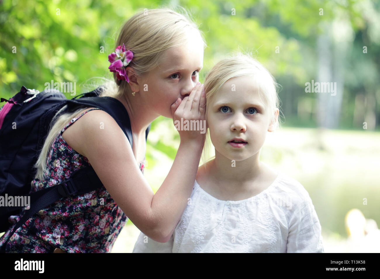 Girls whisper hi-res stock photography and images - Alamy