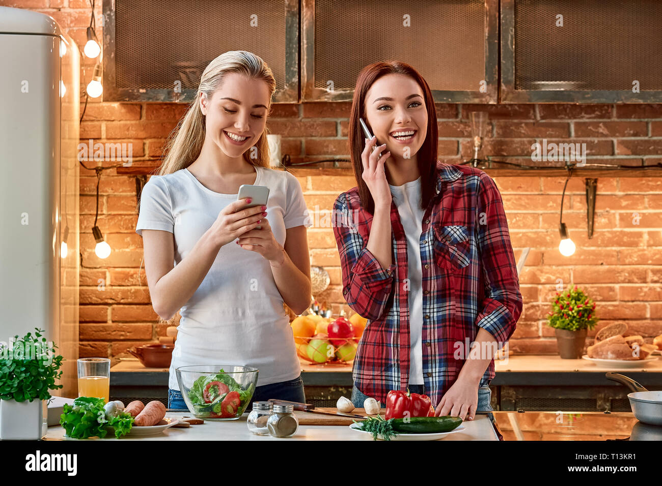Two girls talking friends via hi-res stock photography and images - Alamy