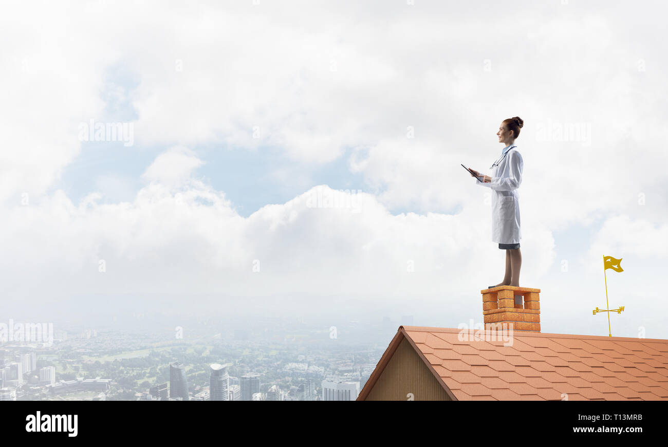 Woman doctor is ready to help the whole city Stock Photo - Alamy