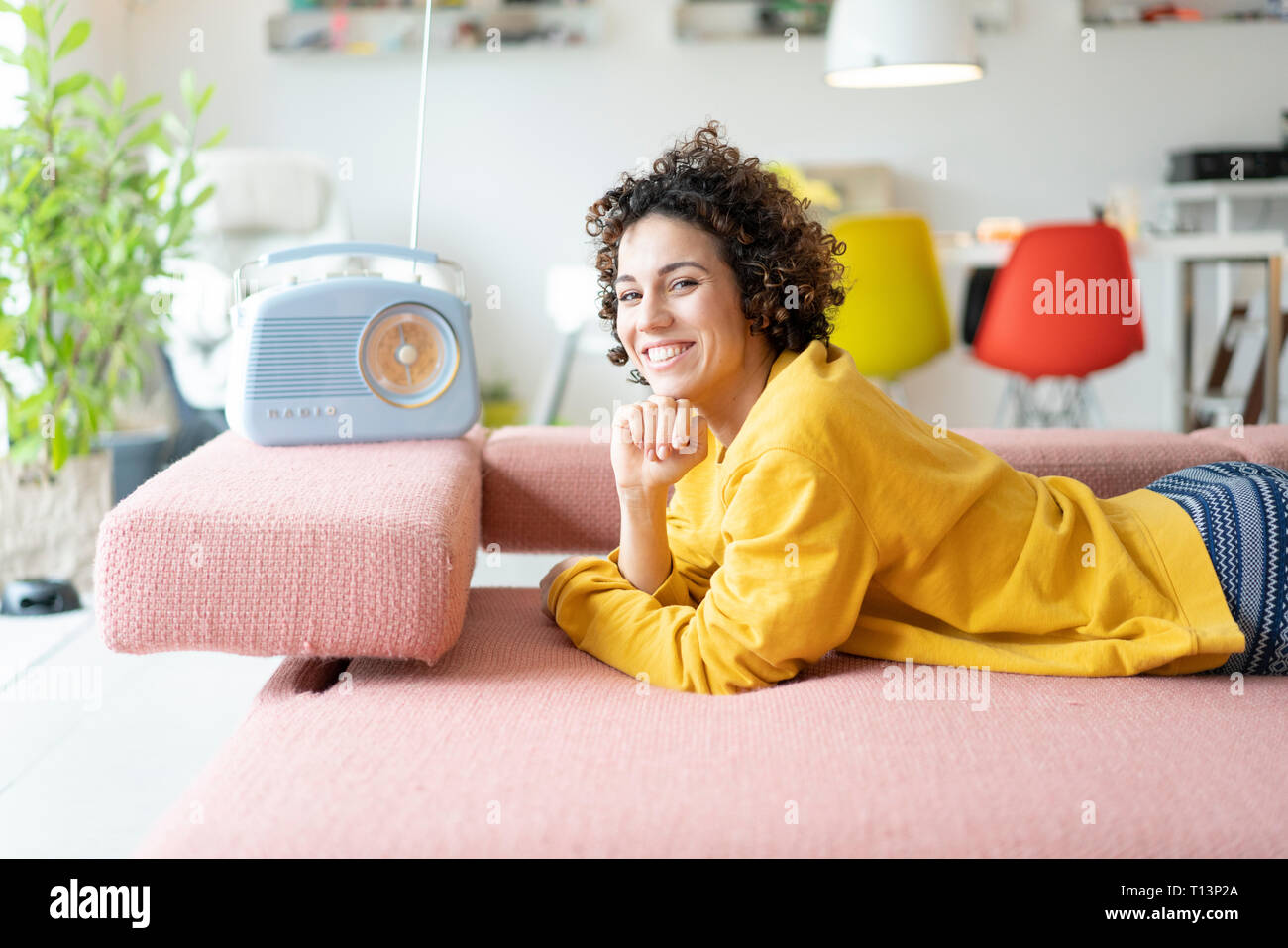 Listening to radio hi-res stock photography and images - Alamy