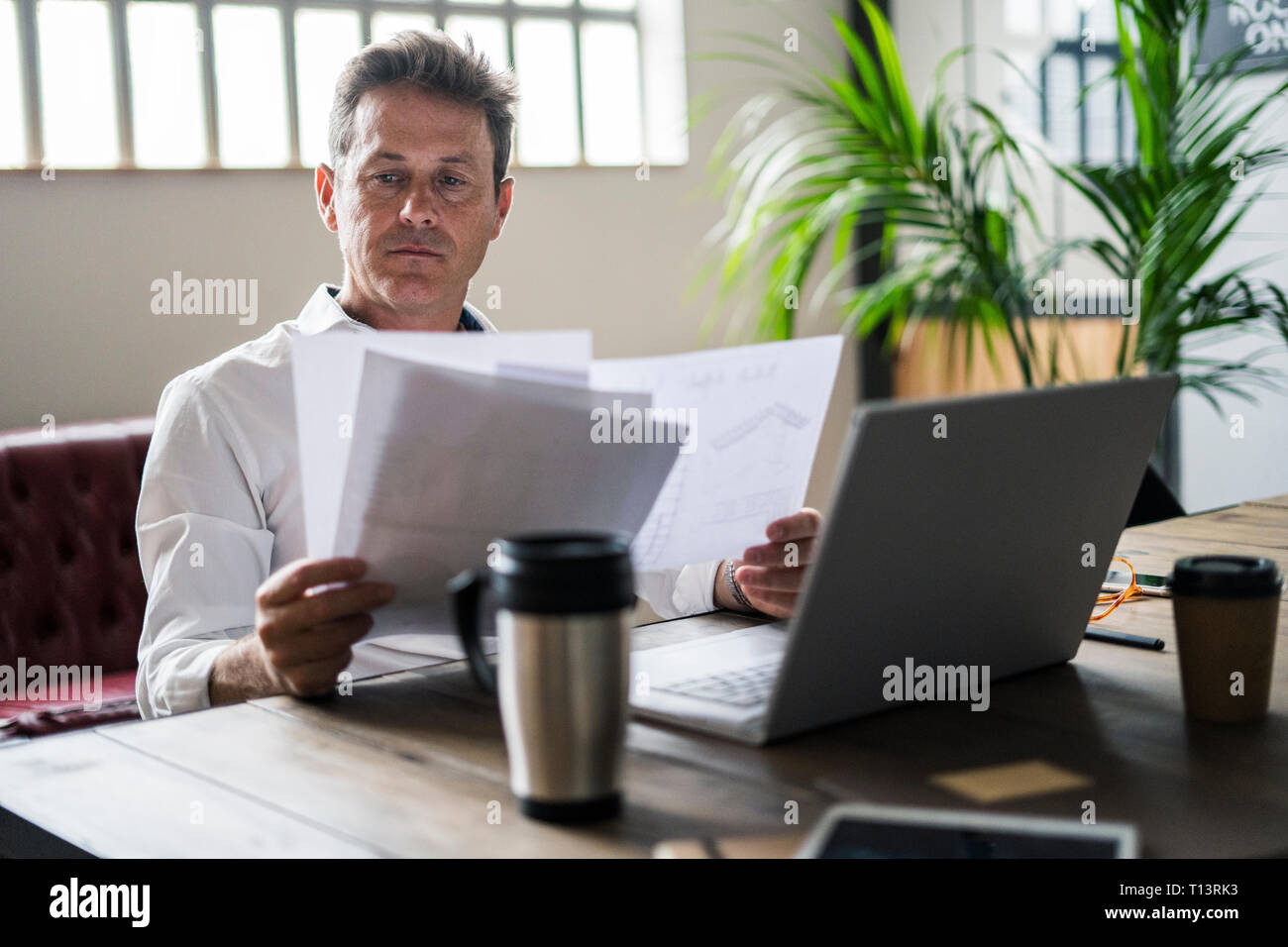 Reviewing documents hi-res stock photography and images - Alamy