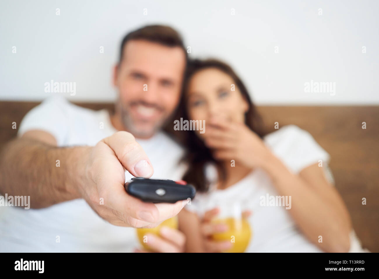 Happy watching tv hi-res stock photography and images - Alamy